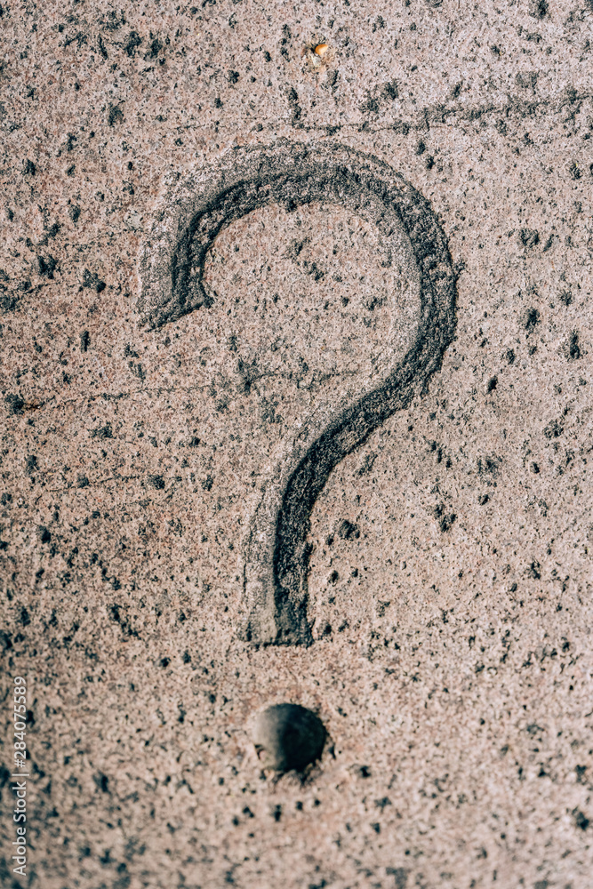 Question mark carved on a stone. Punctuation mark on granite. Stone ...