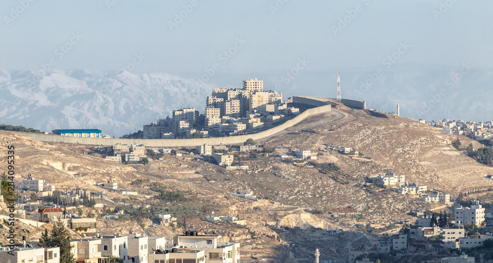 The Israeli security fence separating Israel from the West Bank of ...
