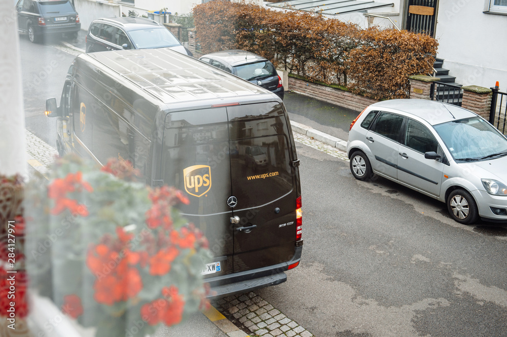 PARIS, FRANCE - DEC 10, 2015: POV of customer at UPS United Parcel ...