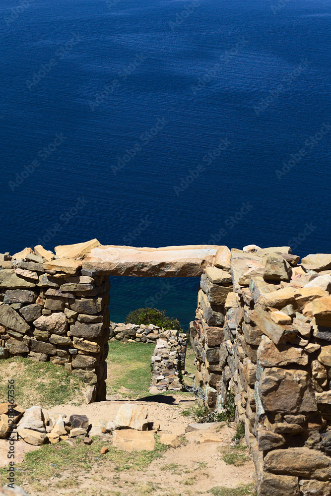 View through a door frame of the Chinkana archeological site of ...