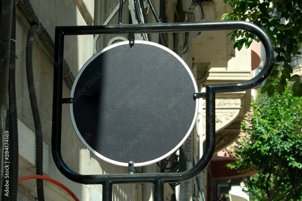 Horizontal side view of empty black signage on business skyscraper with ...