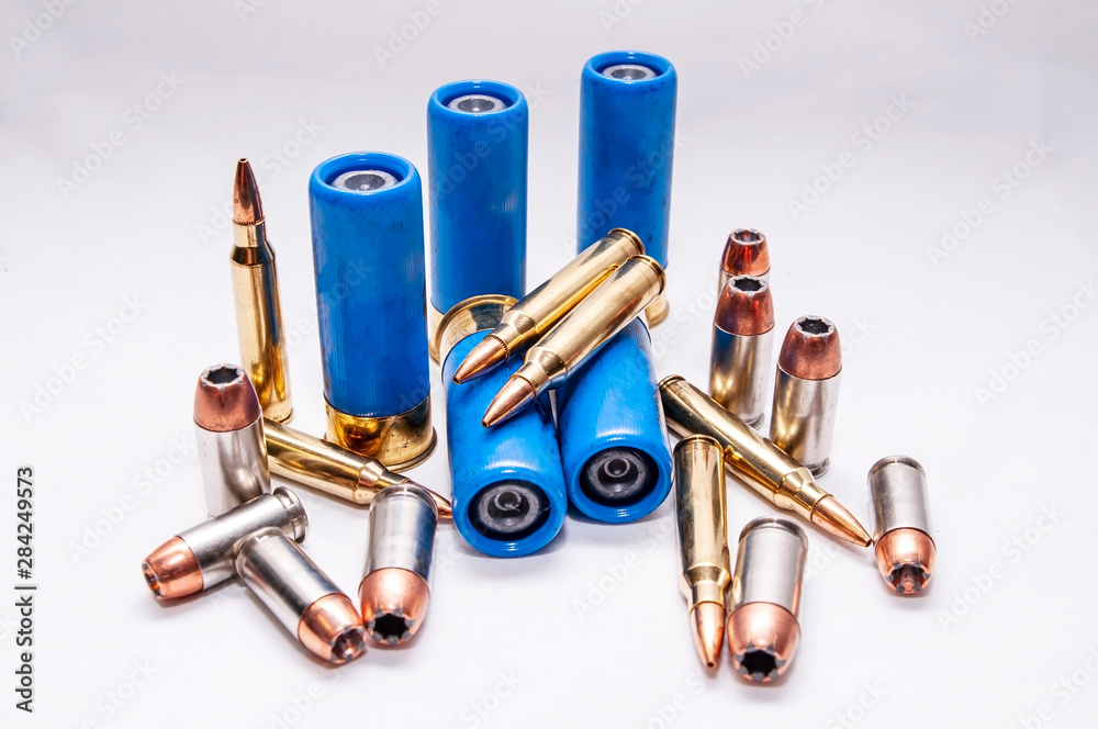 Rifled slug shotgun shells with 223 caliber bullets along with 45 ...