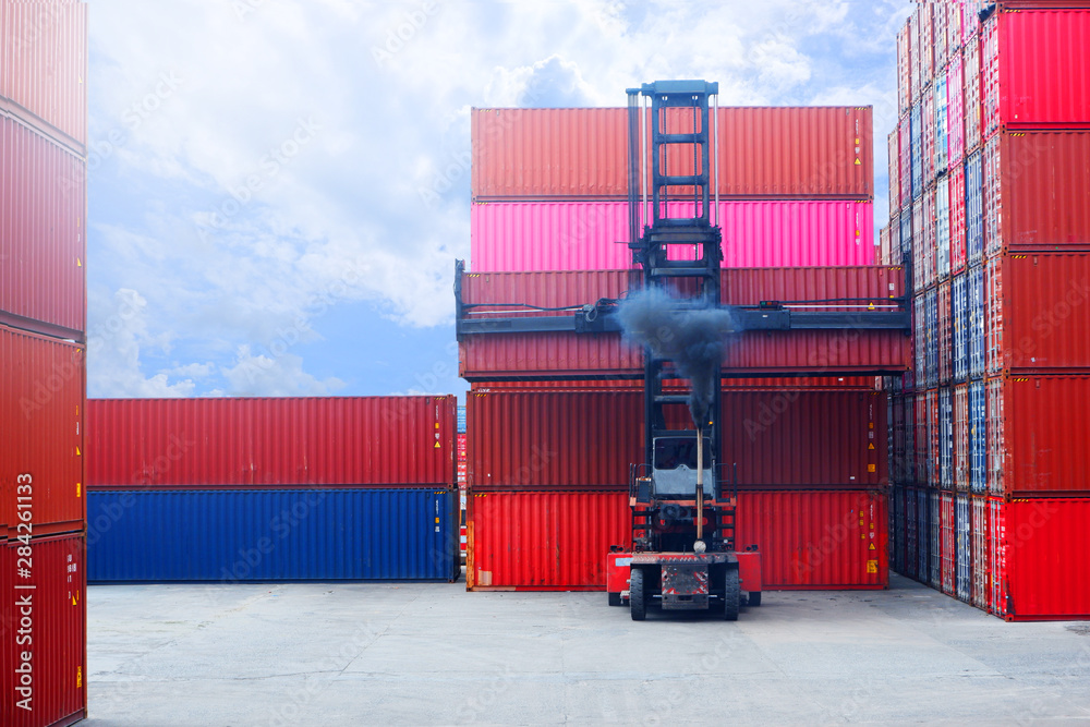 Industrial container yard with forklifts that work in shipyards to ...