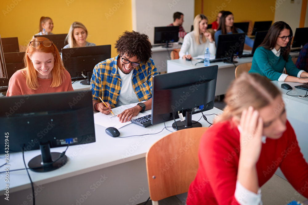 Group of diverse students in an exam in a classroom. Stock Photo ...