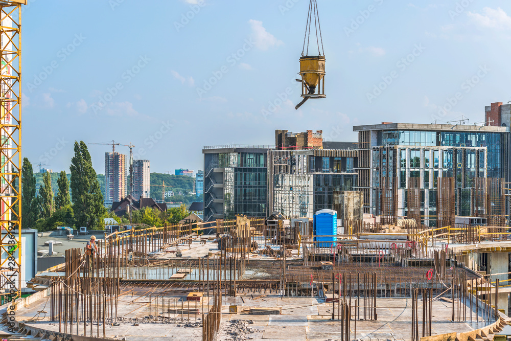 New building under construction and construction site of a residential ...