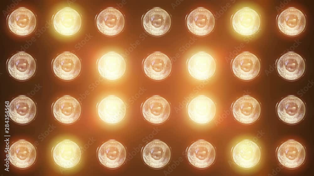 Wall of flashing lights and bright spotlights. Looped animations with ...