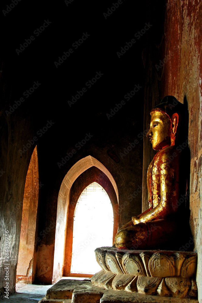 Myanmar, Bagan, profile of Statue of a sitting golden Bhudda on his ...
