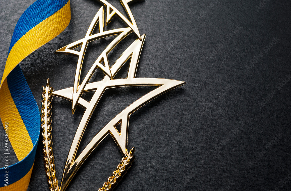 Gold shooting star trophy for a competition winner Stock Photo | Adobe ...