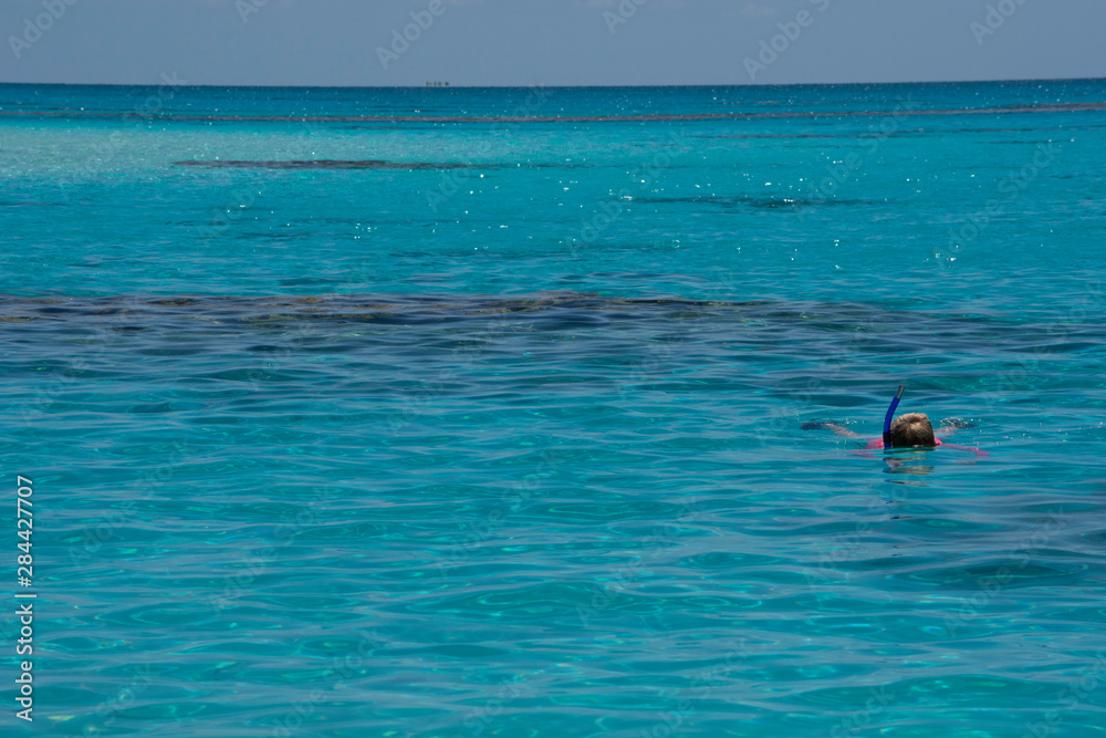 Cook Islands. Palmerston Island, a classic atoll. Snorkeling in crystal ...