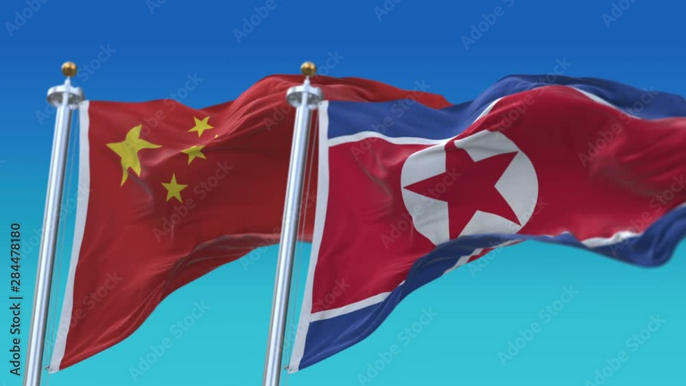 Vídeo do Stock: 4k Seamless North Korea and China Flags with blue sky ...