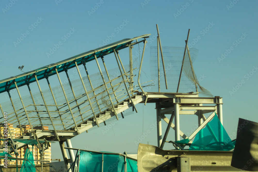 Broken overpass. The accident with a metal structure. Broken metal ...