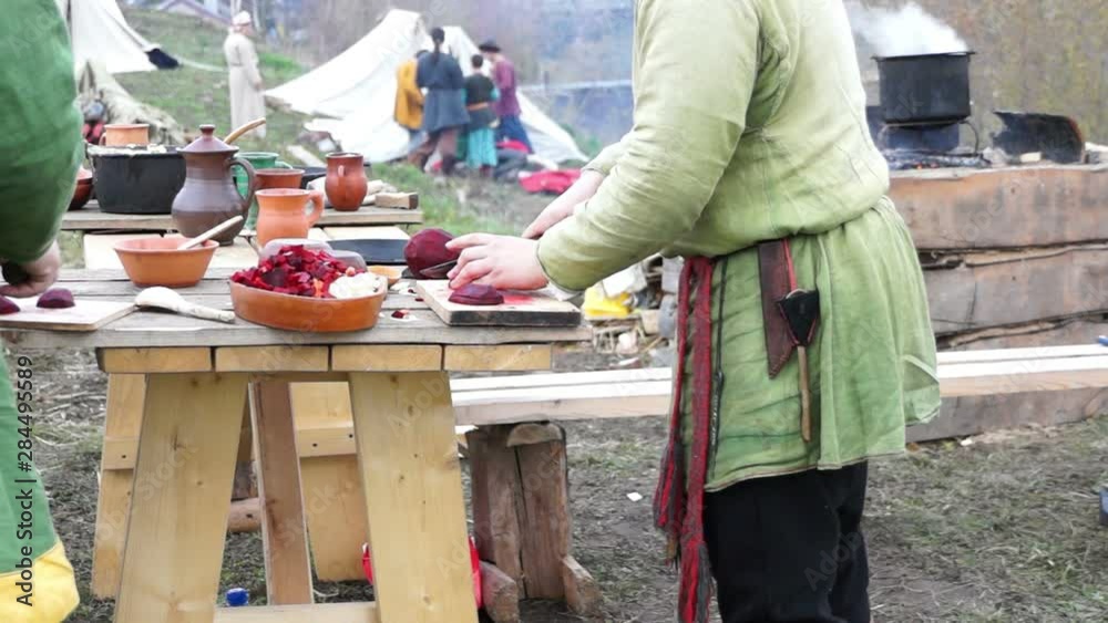 Camping lunch in nature. The cook prepares it from the most simple ...