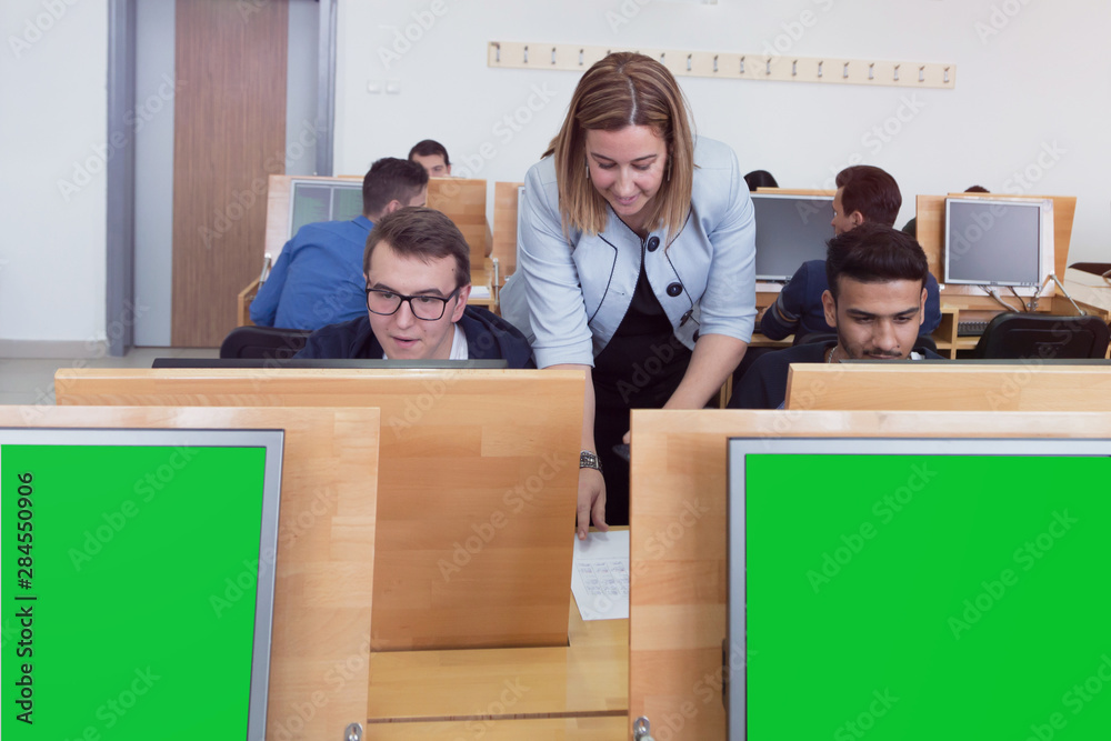 Female attractive professor explain lesson to students and interact ...