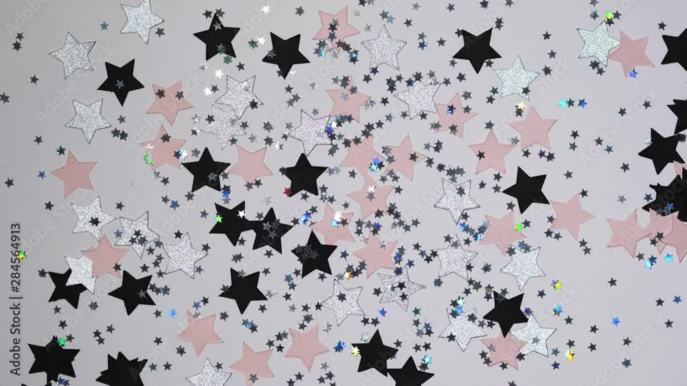 stars shimmer on a light background. hologram laser silver stars ...