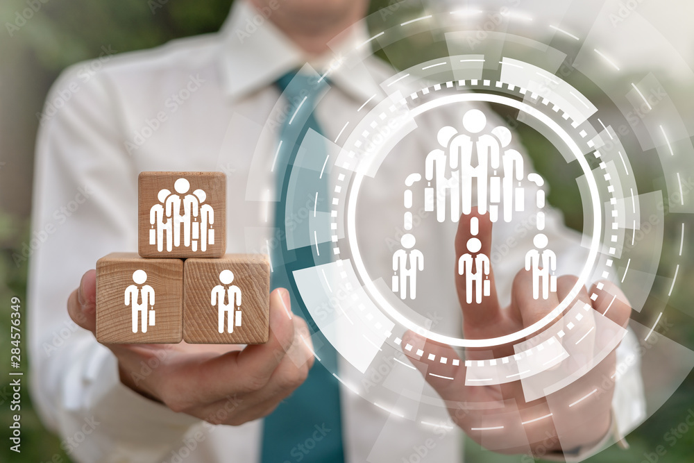 Organization and team structure symbolized with cubes on businessman ...