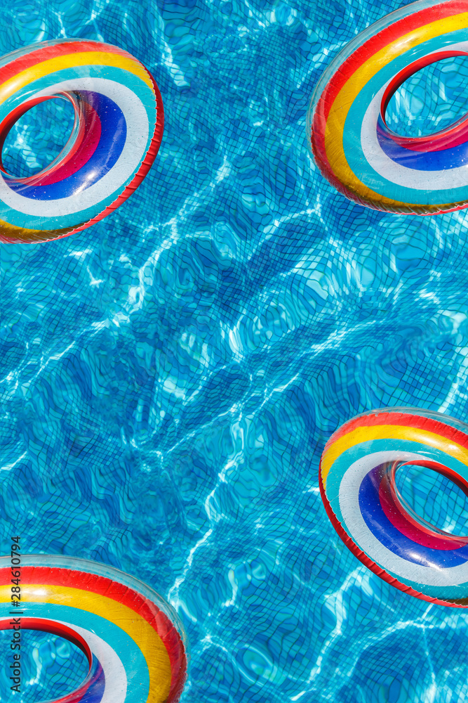 Inflatable water activities four circles tuba float on the water in the ...