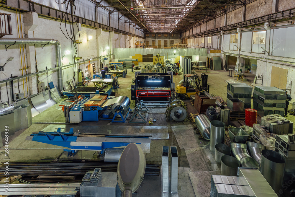 Metalworking factory. Manufacturing of pipes and equipment parts for ...
