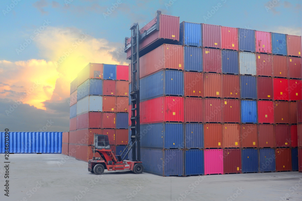 Forklift container loading and unloading cargo into the import-export ...