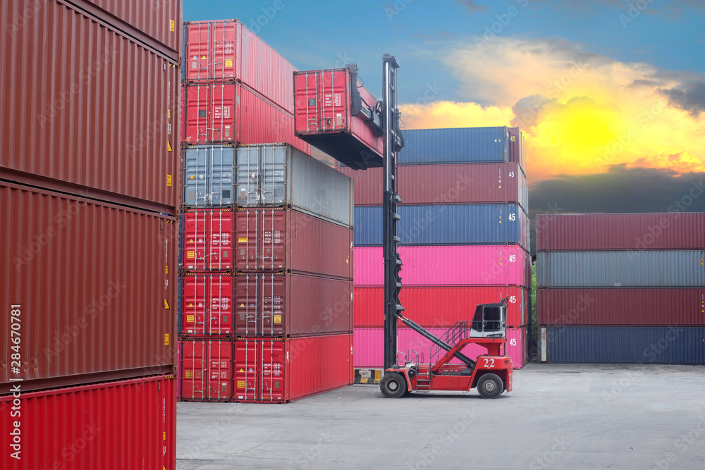 Forklift container loading and unloading cargo into the import-export ...