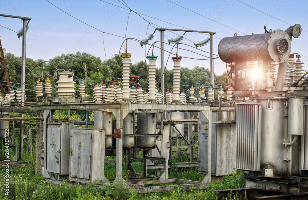 Small electrical substation with many ceramic insulators, high voltage ...