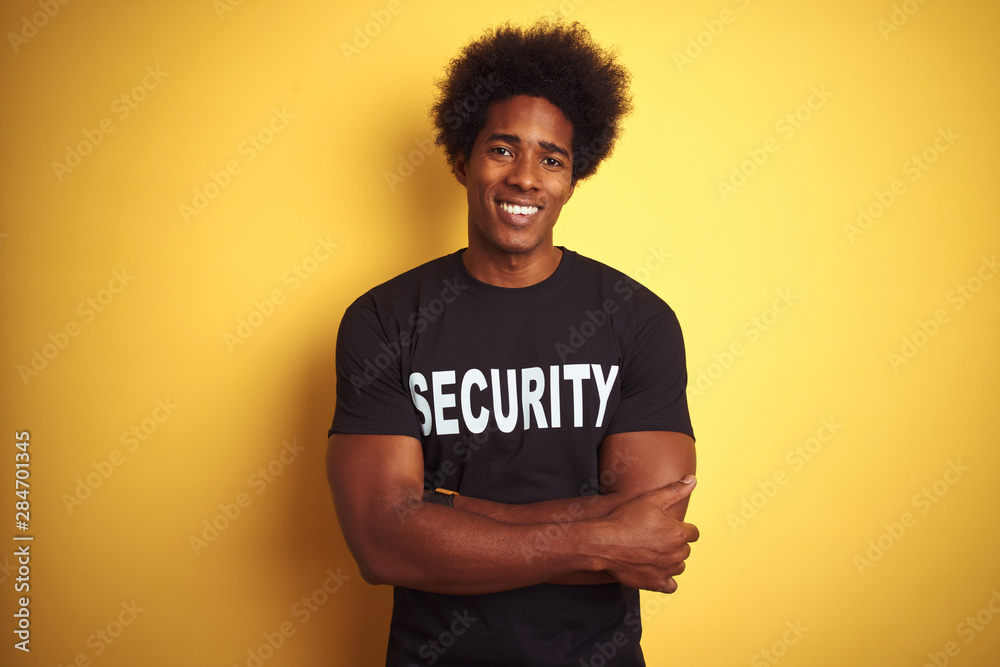American safeguard man with afro hair wearing security uniform over ...
