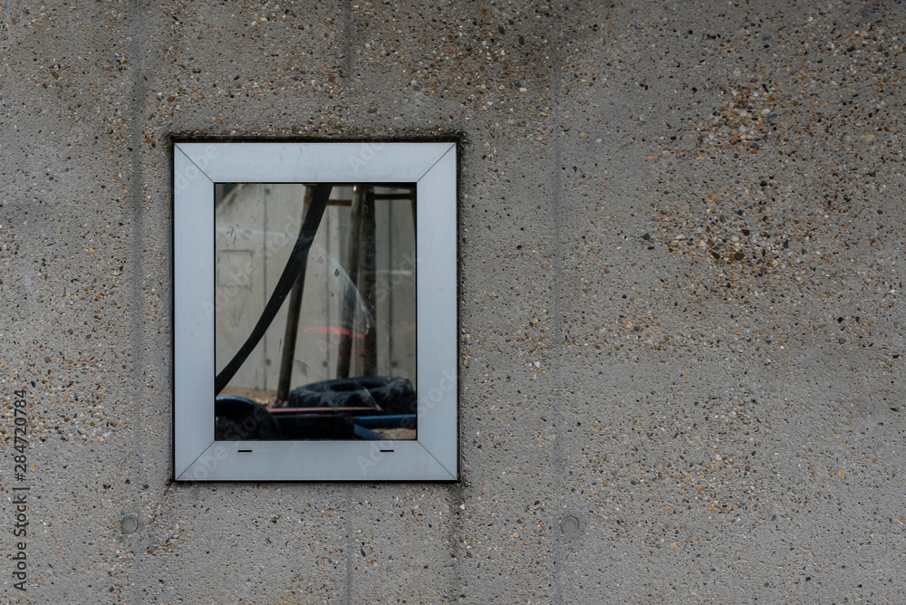 Window on a concrete wall, One Window on a bare Facade, bare Wall with ...