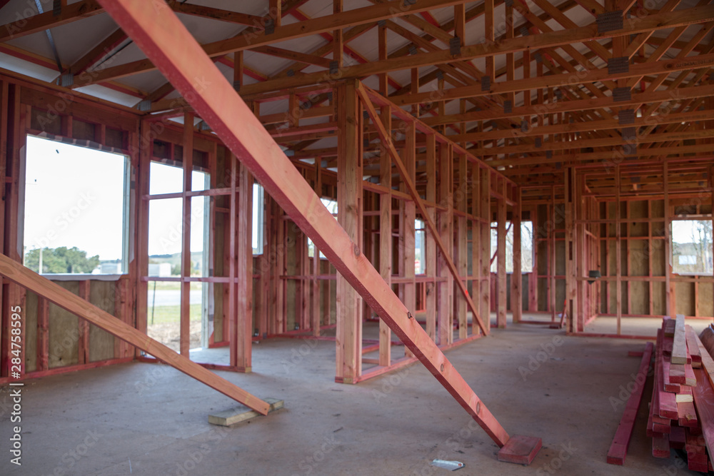 Treated timber framing, roof bracing and weatherproofing paper in a new ...