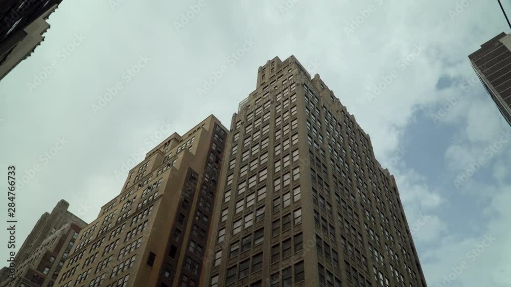 Generic day time establishing shot vertical look straight up view of ...