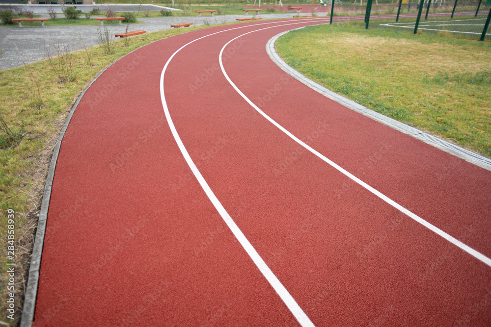 Diminishing perspective of racetrack with lines dividing it into three ...