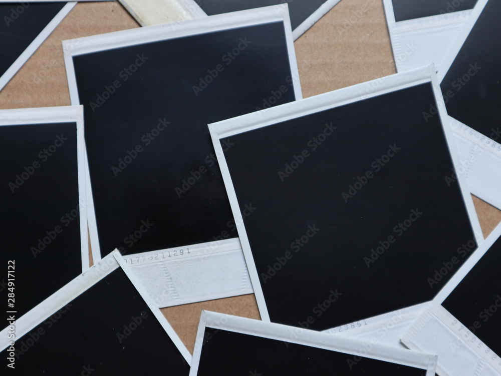 Set of retro photo frames Many polaroid on a cardboard background ...