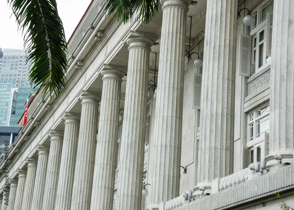 old building with columns. greek style columns. singapore architecture ...