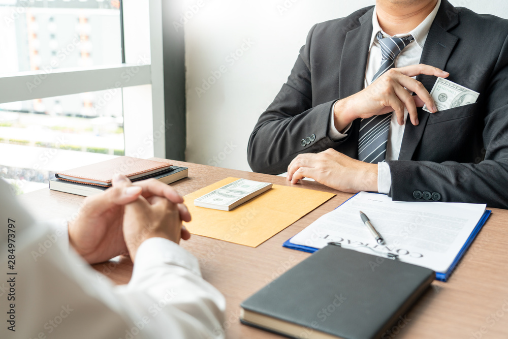 Bribery and corruption, Businessman hand giving money and receive in ...