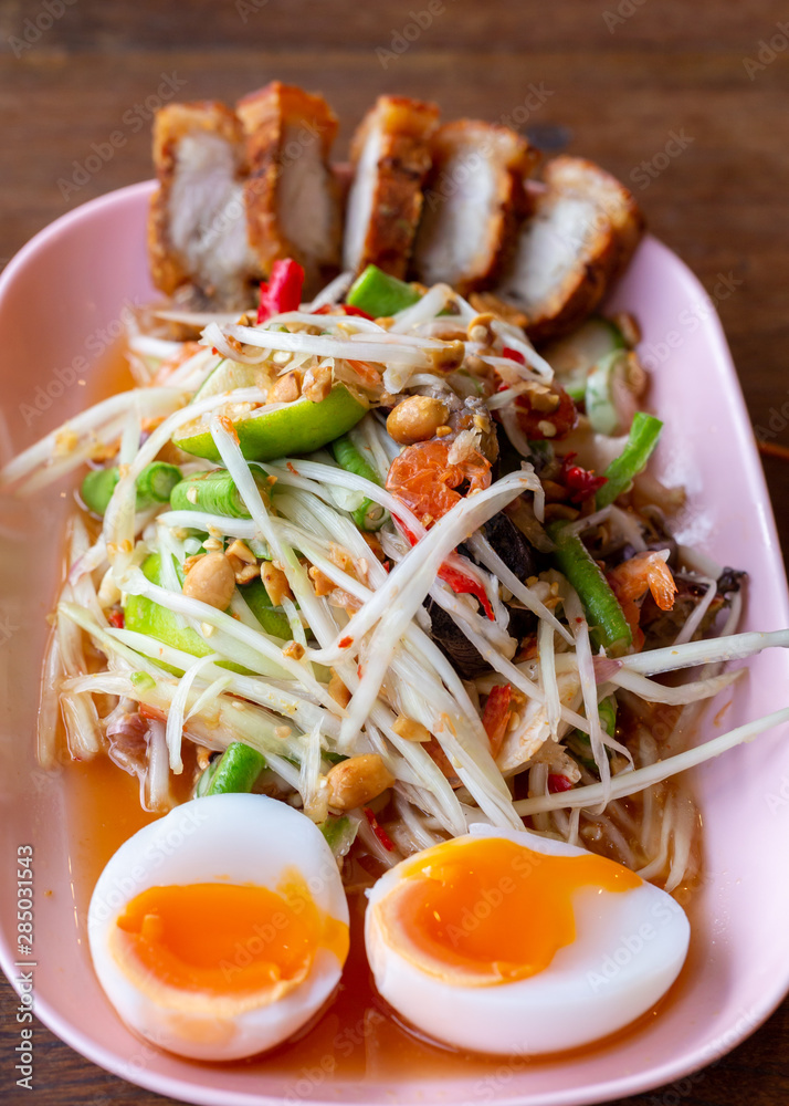 Papaya salad with salted crab, boiled egg and Crispy pork . Somtum Poo ...