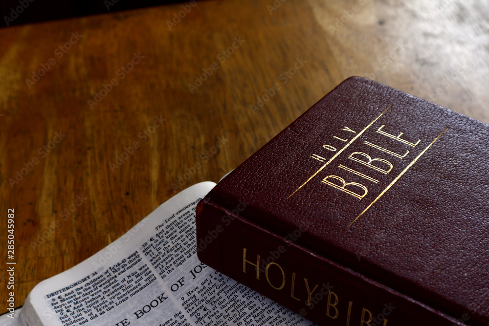 Holy Bible on a table Stock Photo | Adobe Stock