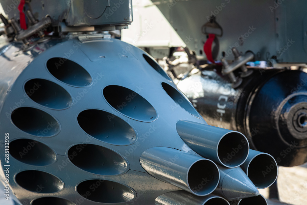 Rocket pod with empty rocket launcher under the wingtip of a helicopter ...
