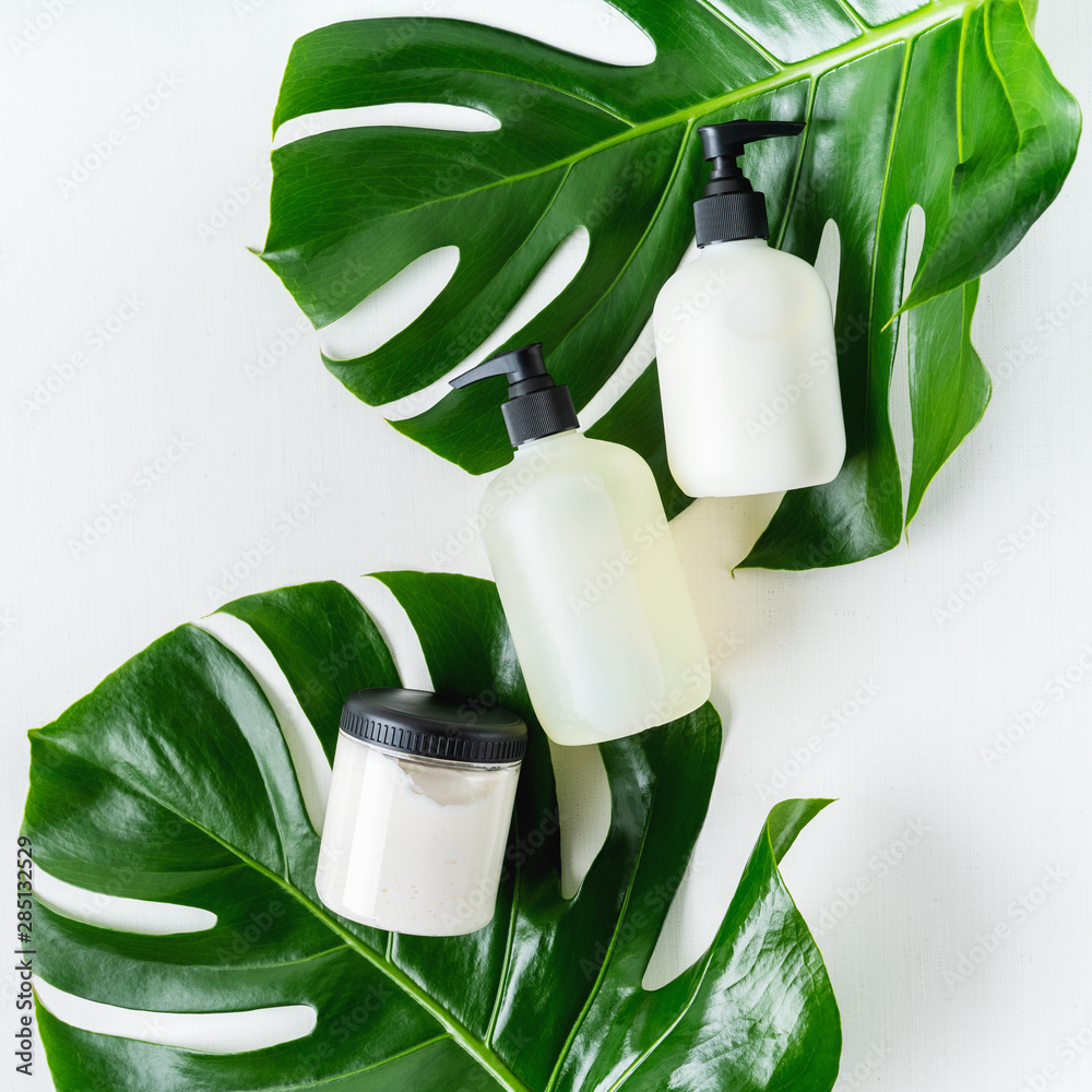 Beauty background with Set organic body care cosmetic products on green ...