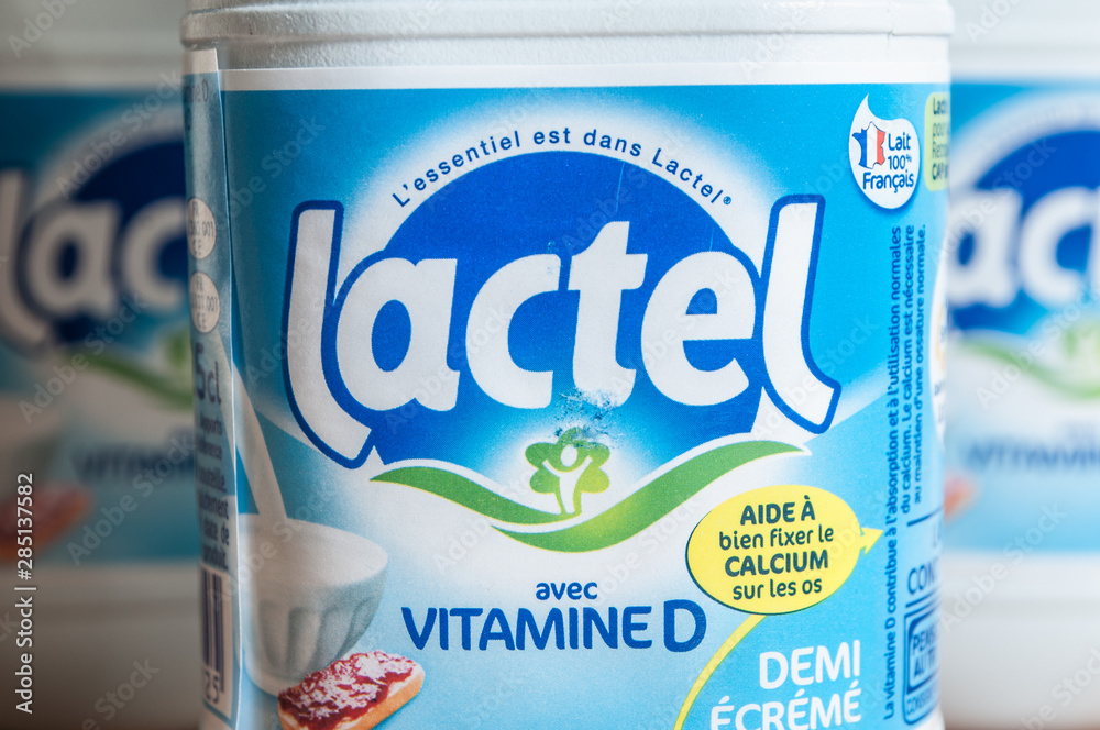 closeup of milk bottles of Lactel brand - Lactel is the french brand ...