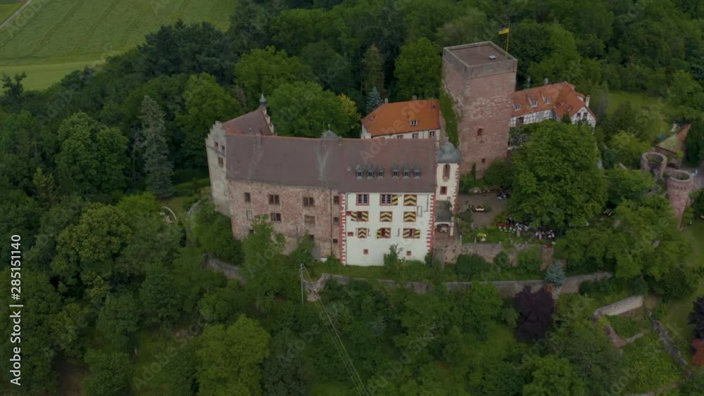 Aerial view of the village and castle Gamburg in Germany. Pan to the ...