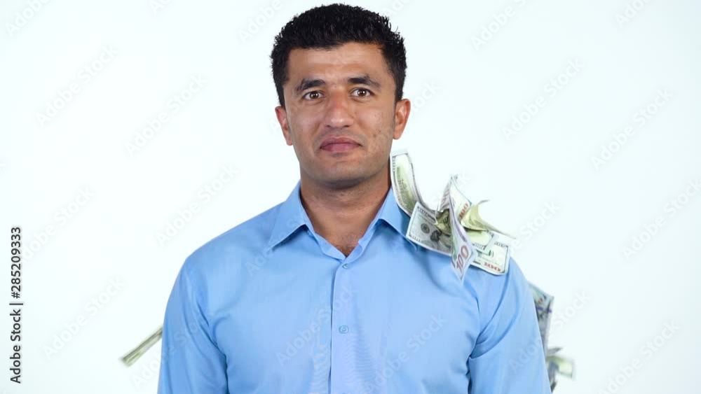 Slow motion of arab man standing on a white background, and a lot of ...
