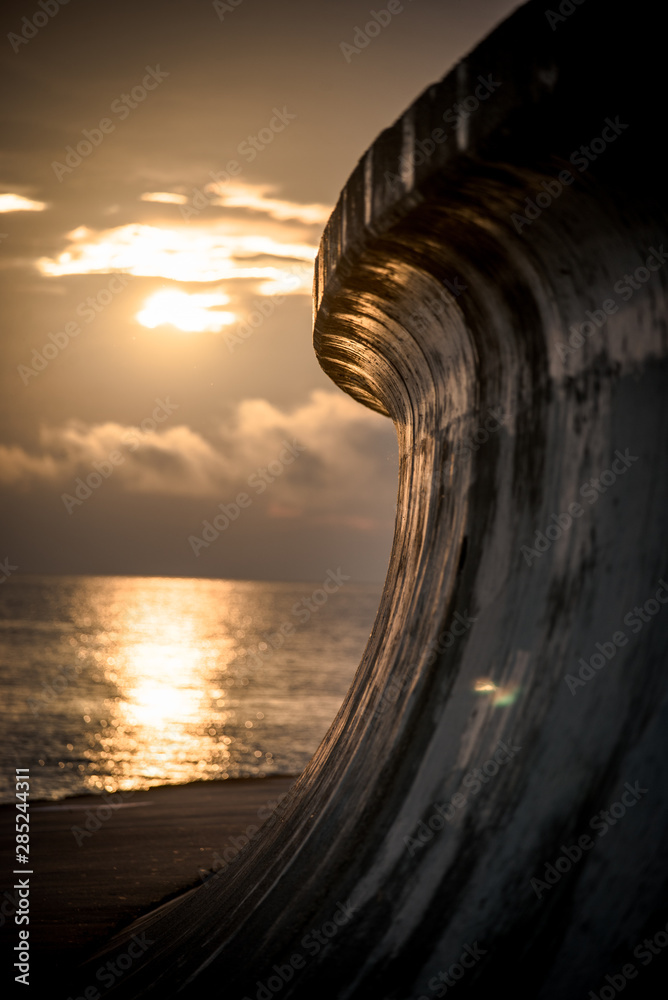 curved wall and railing by sidewalk and sunset Stock Photo | Adobe Stock