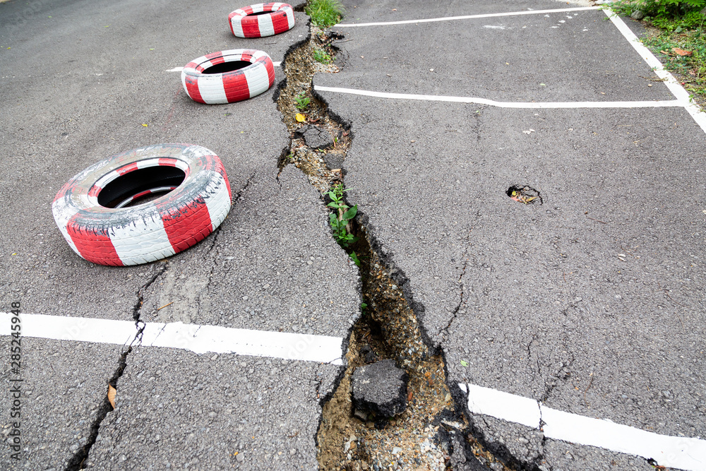 The road in the outdoor public parking lot collapsed,road collapses ...