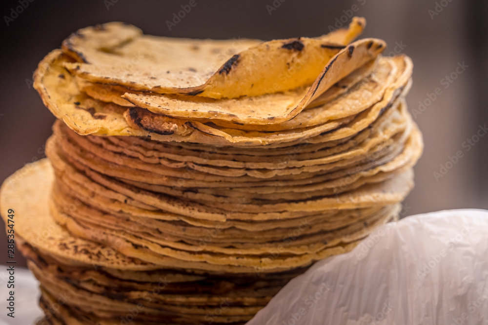 Layers of taco tortilla shells on top of each other forming a tortilla ...