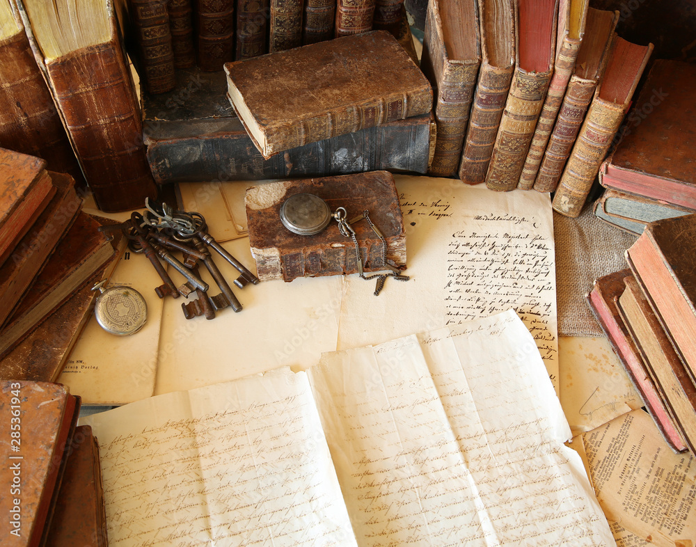 antique workspace with old books and handwriting Stock Photo | Adobe Stock