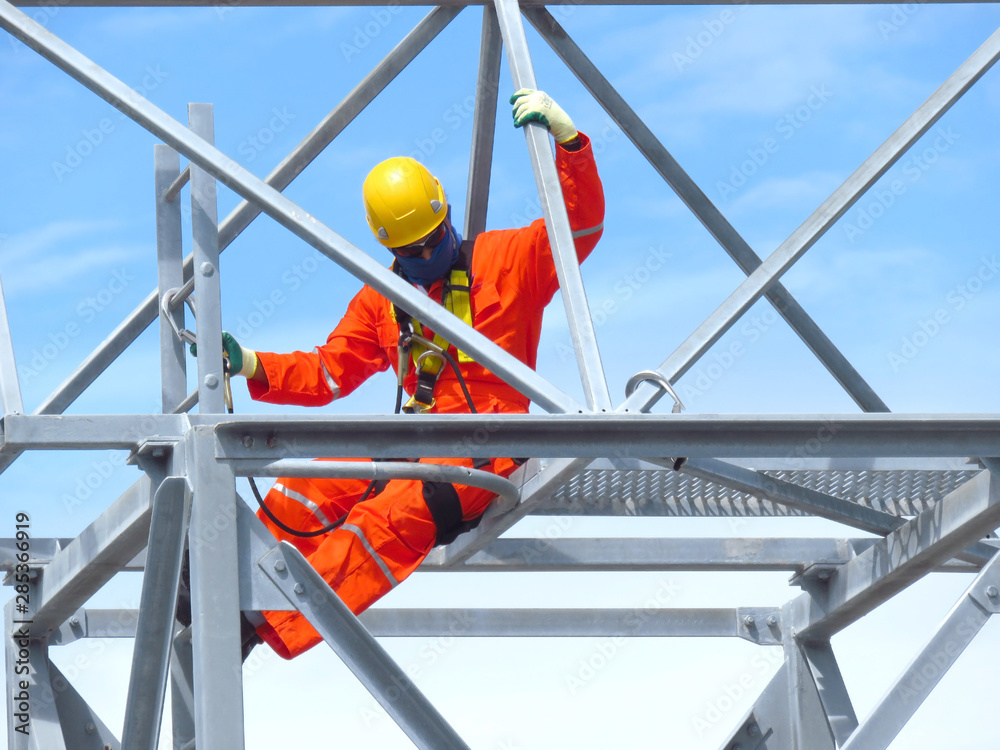 Man Working on the Working at height. Professional industrial climber ...