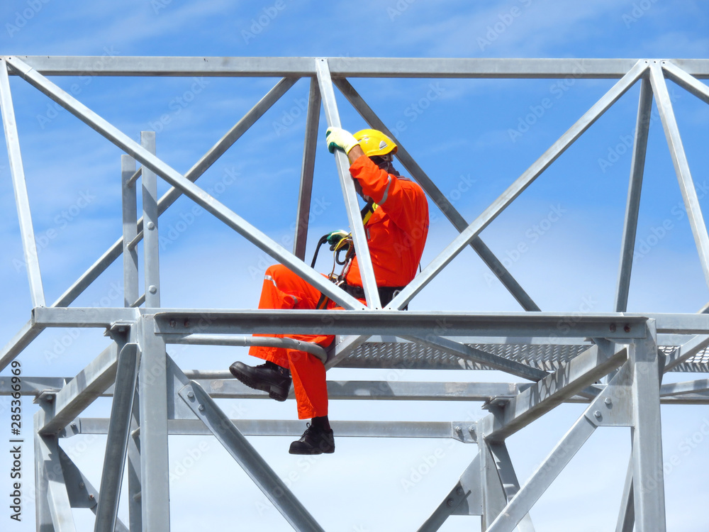 Man Working on the Working at height. Professional industrial climber ...