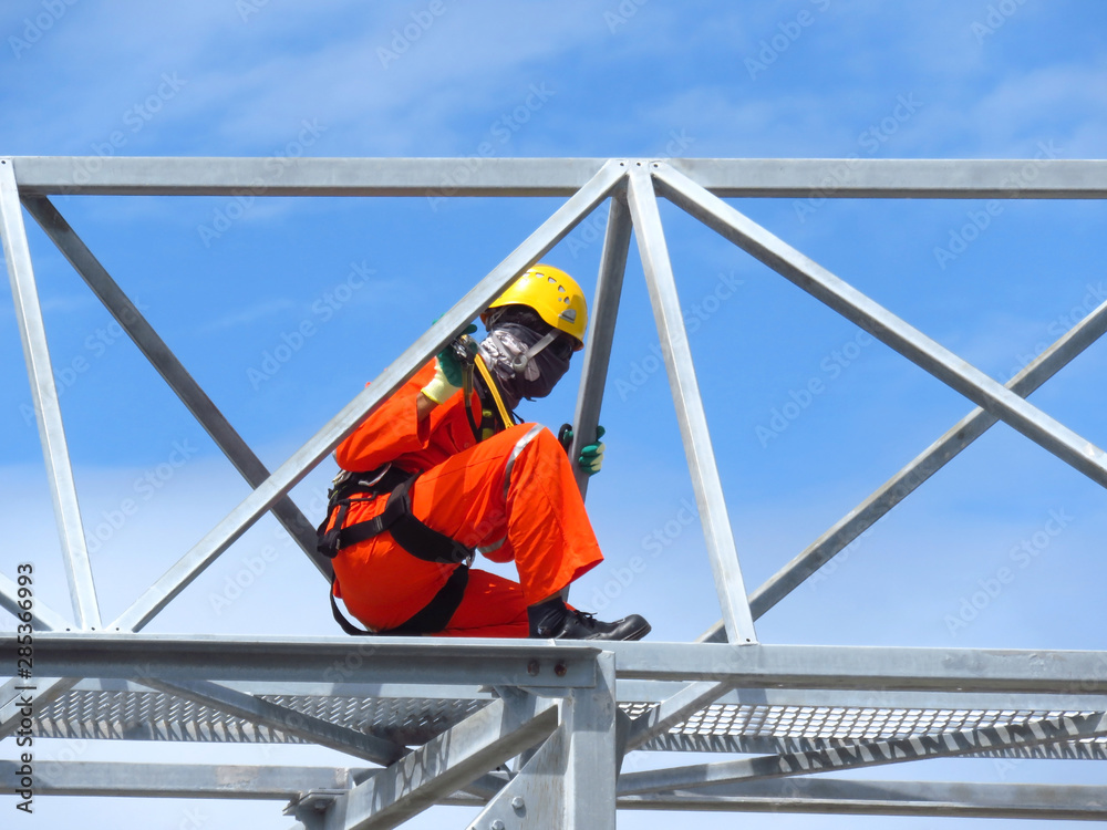 Man Working on the Working at height. Professional industrial climber ...