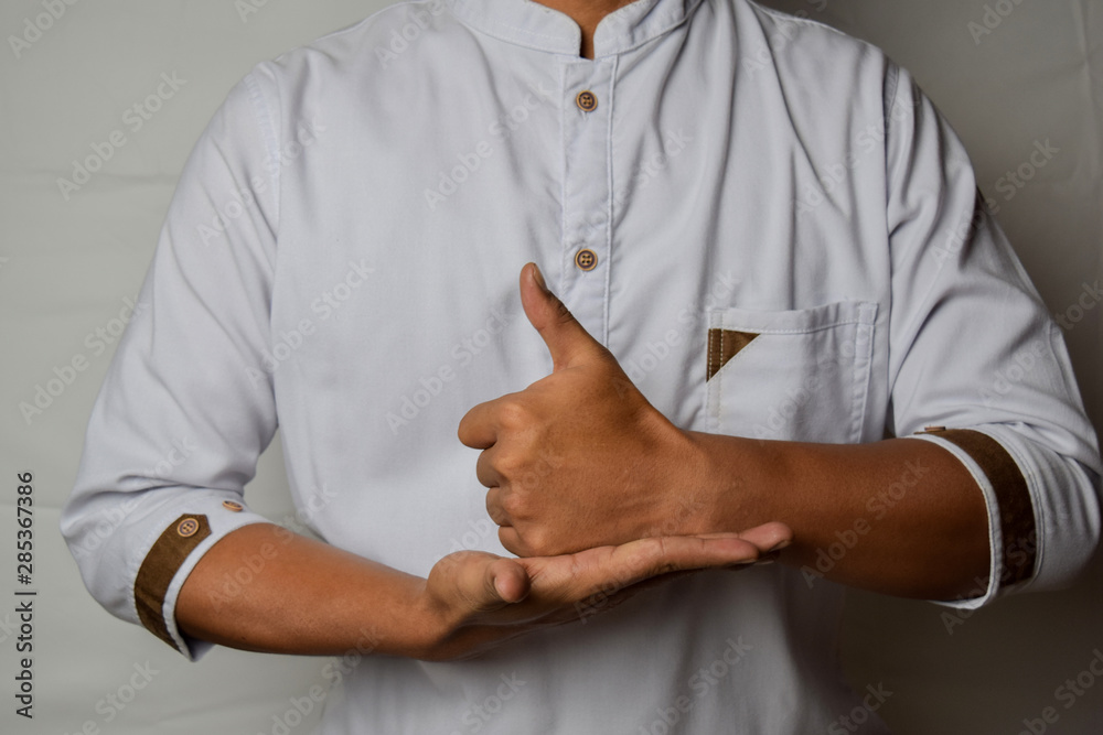 Close up Asian man shows hand gestures it means HELP isolated on white ...