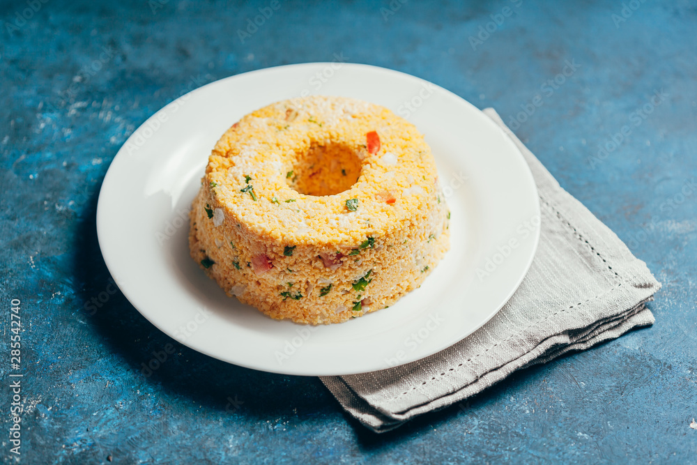 Cuscuz. Traditional Brazilian food prepared from corn flour Stock Photo ...