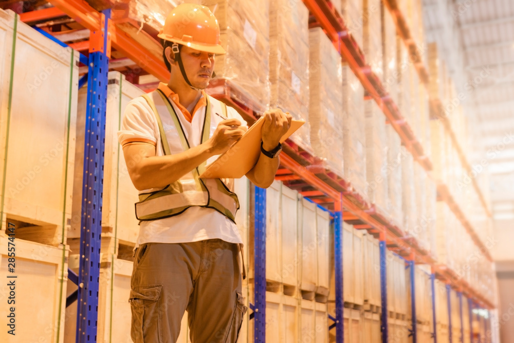 warehouse inventory management, worker in uniform hand holding ...
