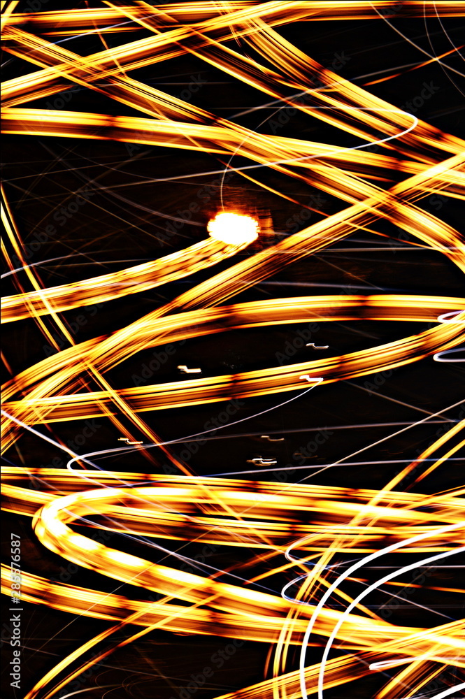 Golden Web- A long exposure photograph showing a series of golden ...